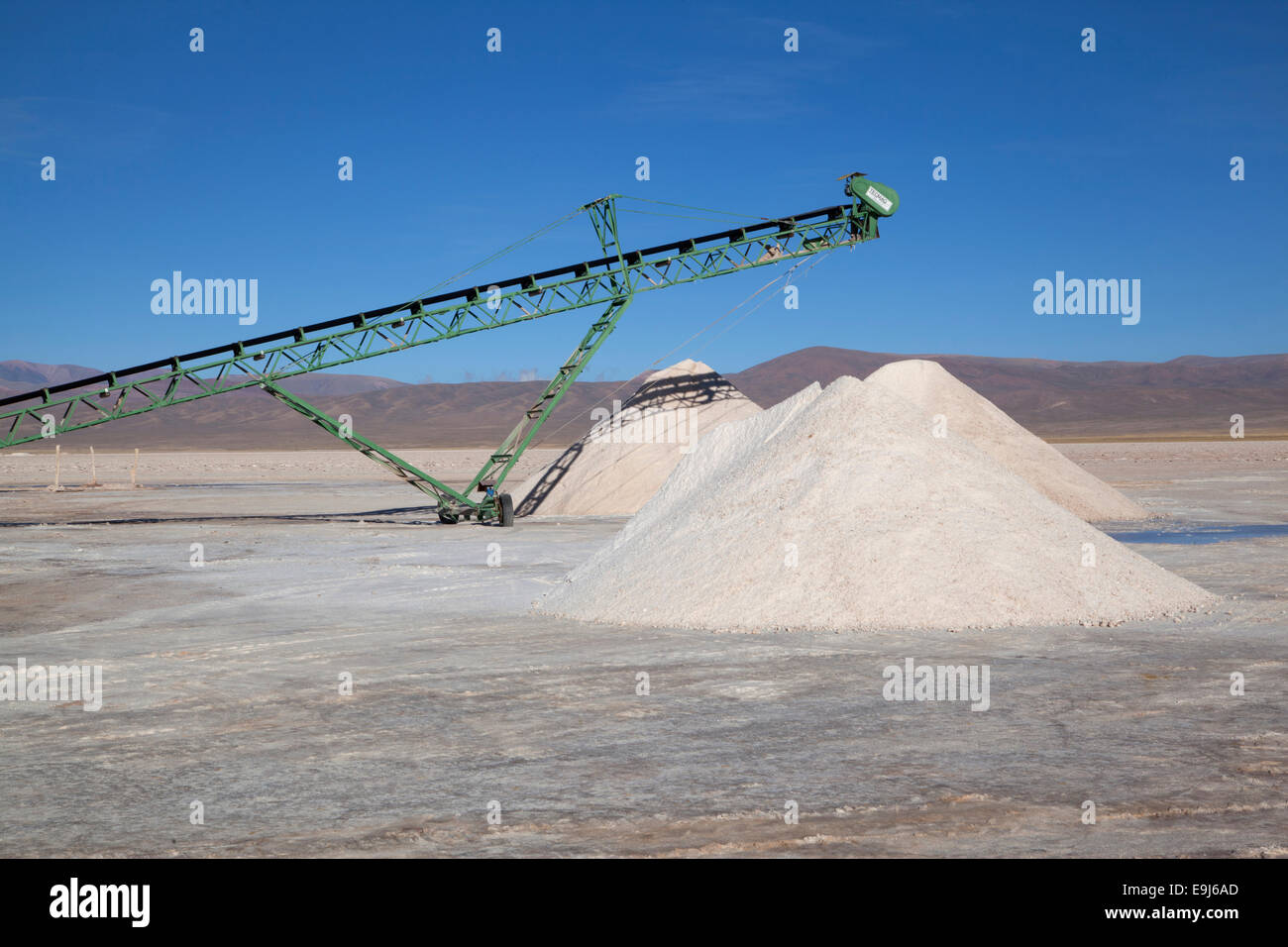 Heaps of salt extracted from the "Salinas Grandes" (Salt flats) at 3450 ...