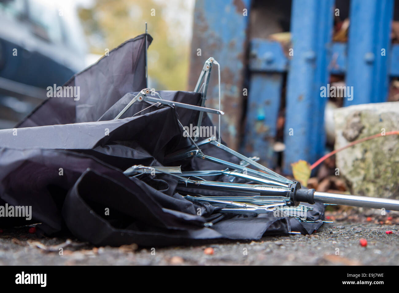 Broken umbrella hi-res stock photography and images - Alamy