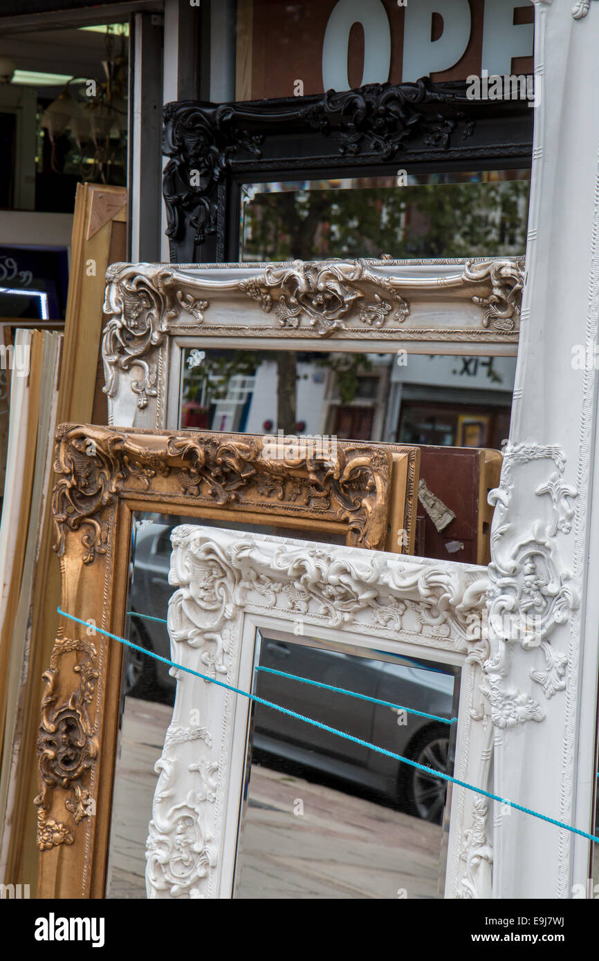 Mirror stacked outside a shop Stock Photo - Alamy