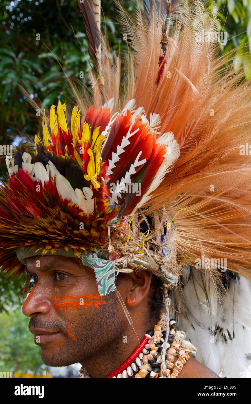 Man of Tufi, Papua New Guinea, with a Headdress of Bird of Paradise ...