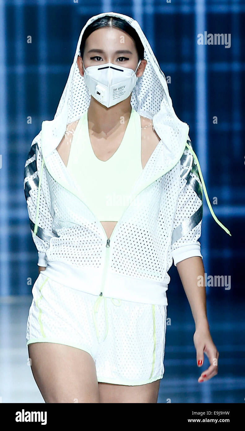Beijing, China. 28th Oct, 2014. A model presents a creation featuring a ...