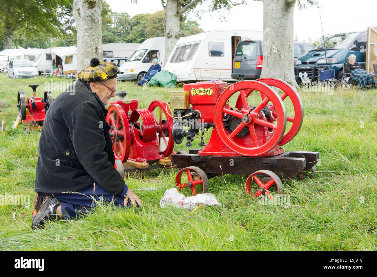Elderly man working on an old steam engine at Morval Vintage Steam ...
