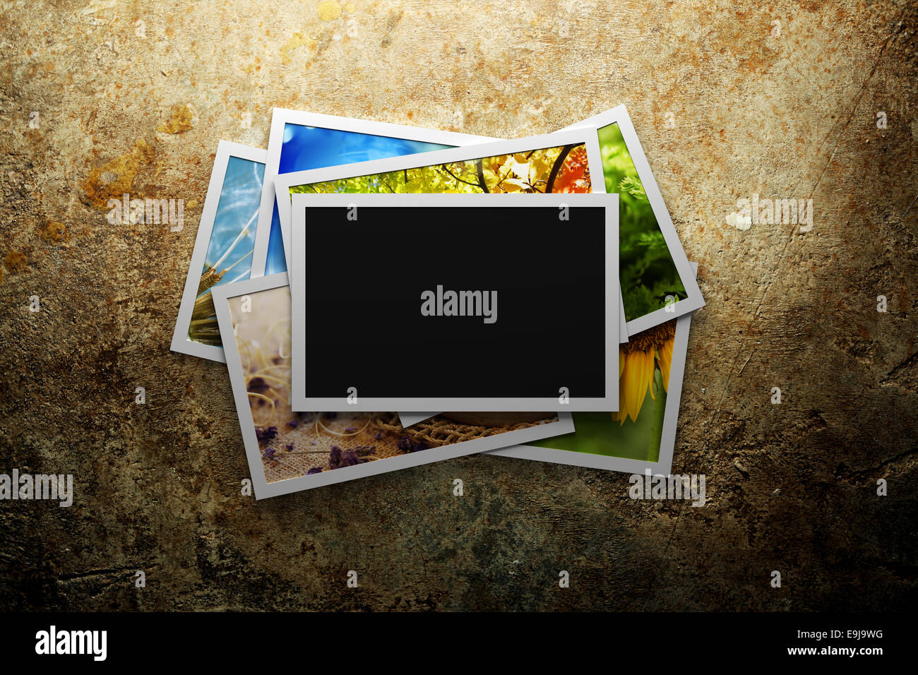 Pile of colorful photos with blank frame Stock Photo - Alamy