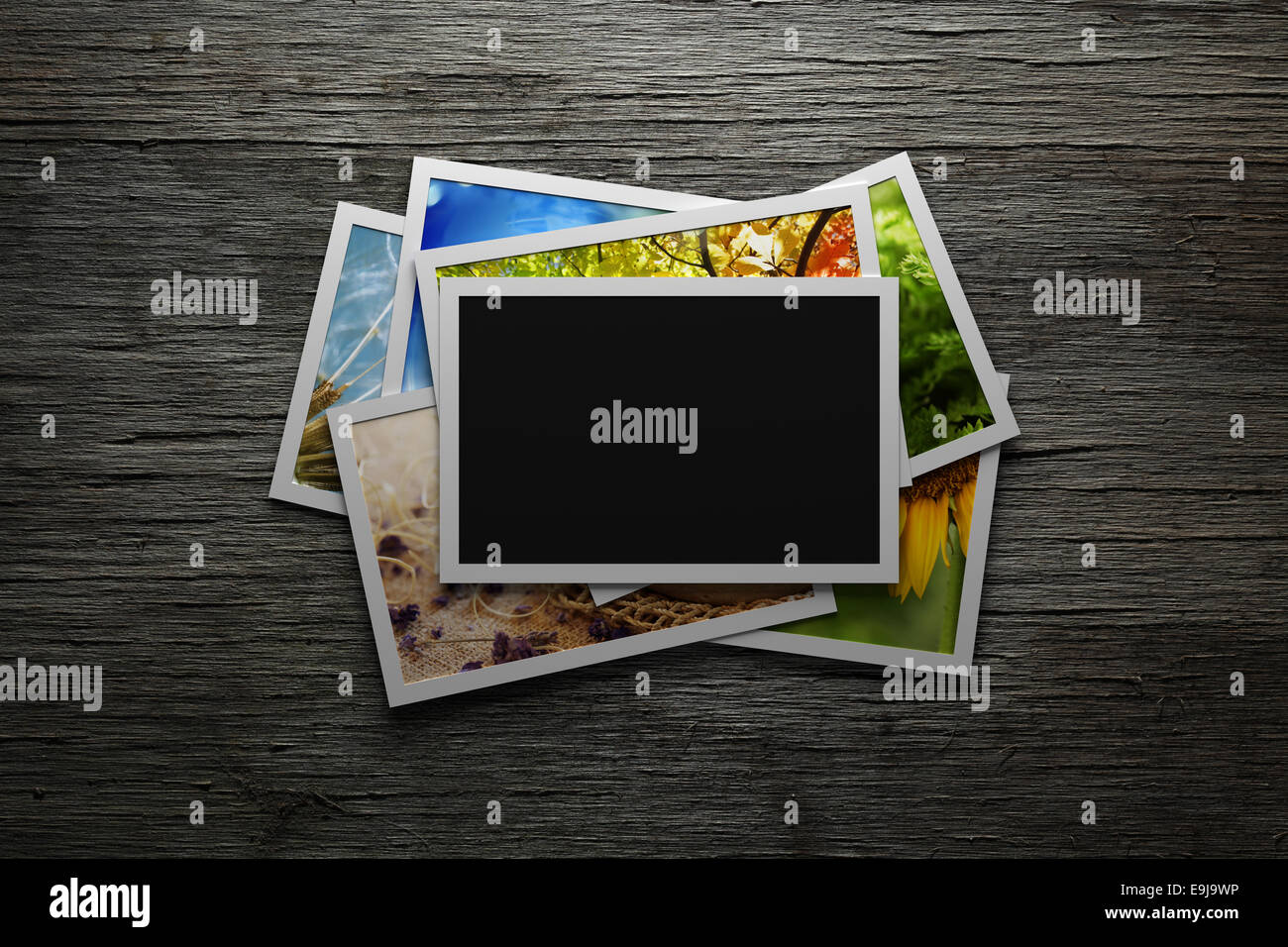 Pile of colorful photos with blank frame Stock Photo - Alamy