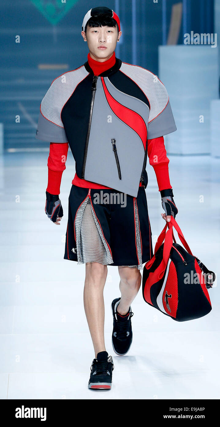 Beijing, China. 28th Oct, 2014. A model presents a sportswear design in ...