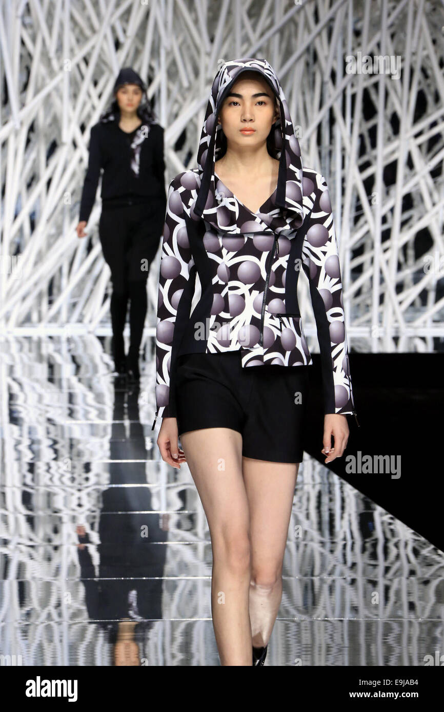 Beijing, China. 28th Oct, 2014. A model presents a fashion creation ...