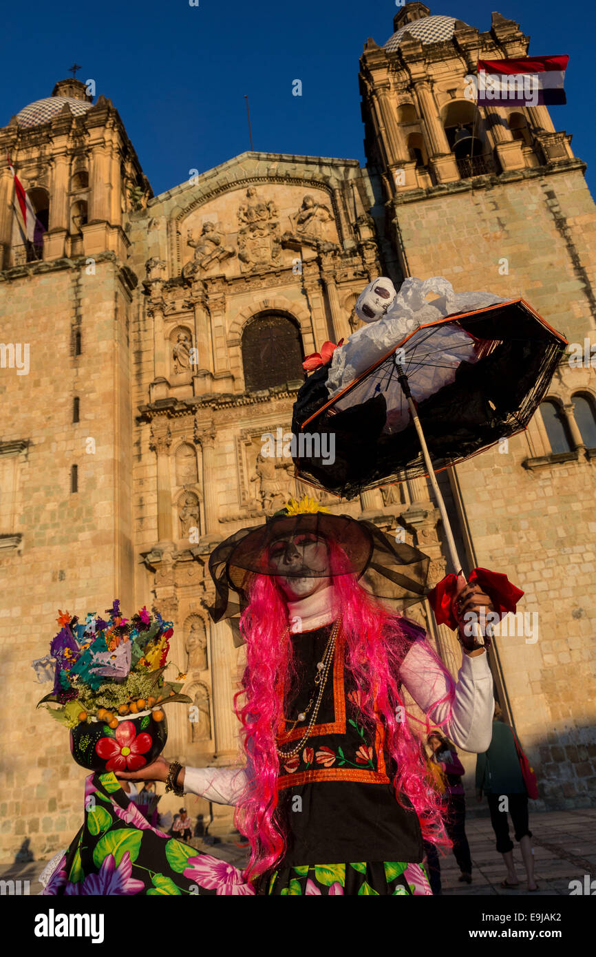 A young woman dressed as a skeleton bride poses in front of the Santo ...