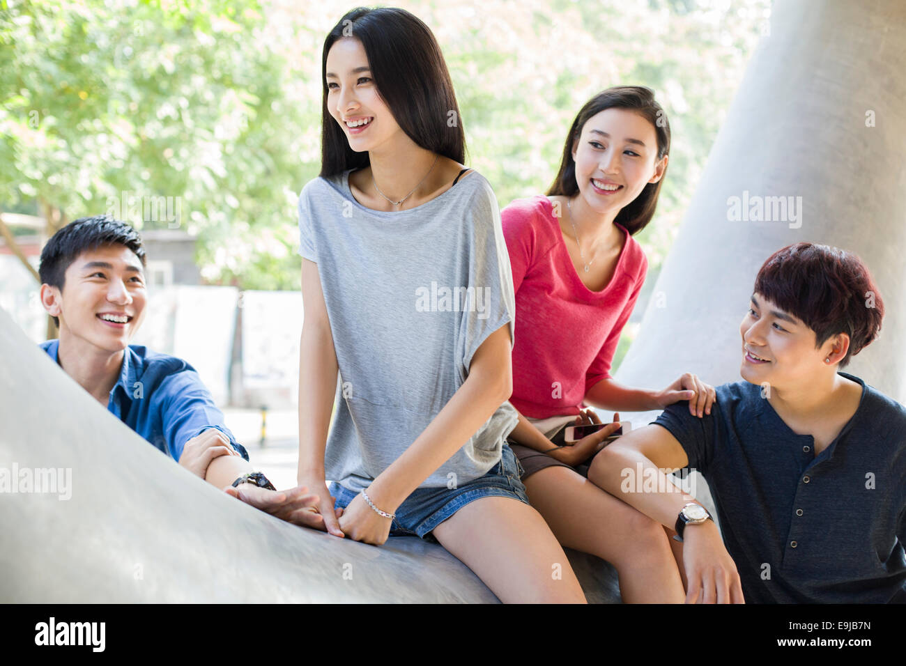 Young friends playing together Stock Photo - Alamy
