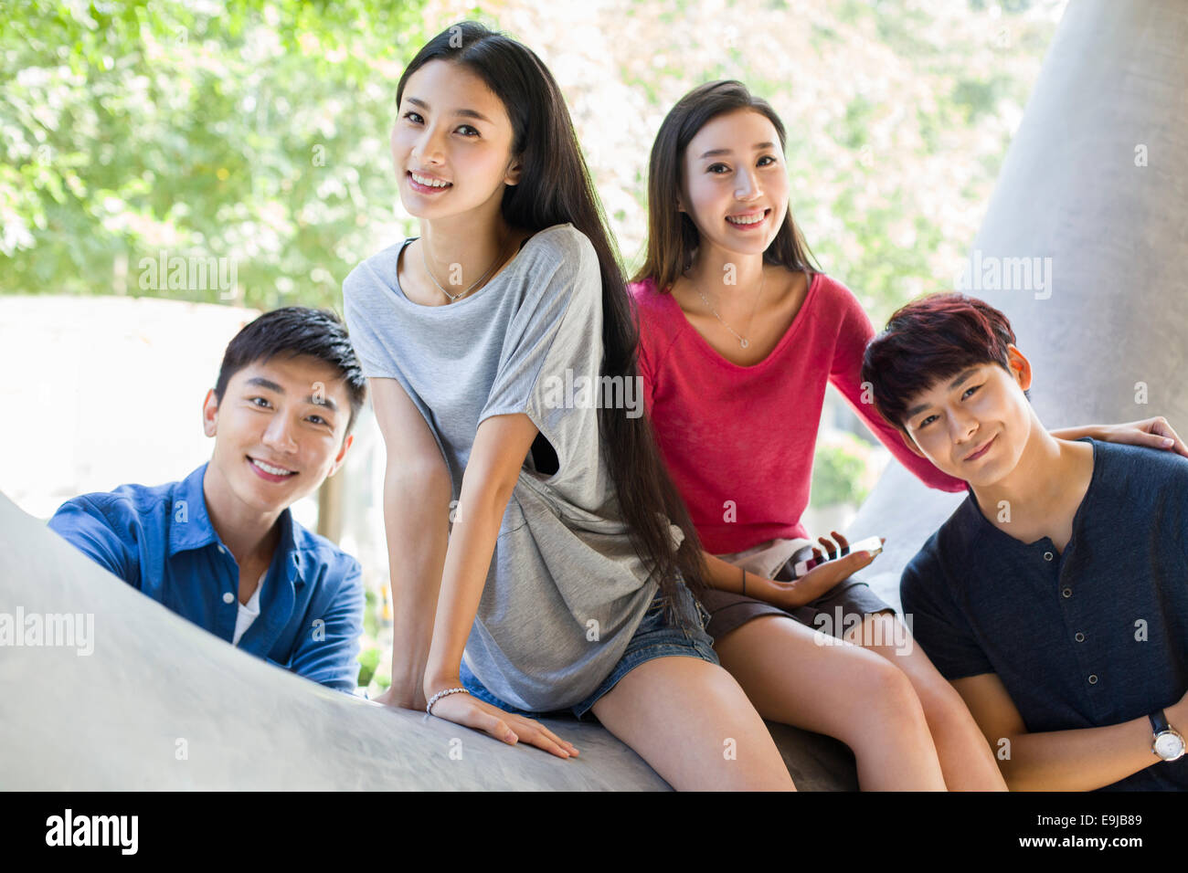 Young friends playing together Stock Photo - Alamy