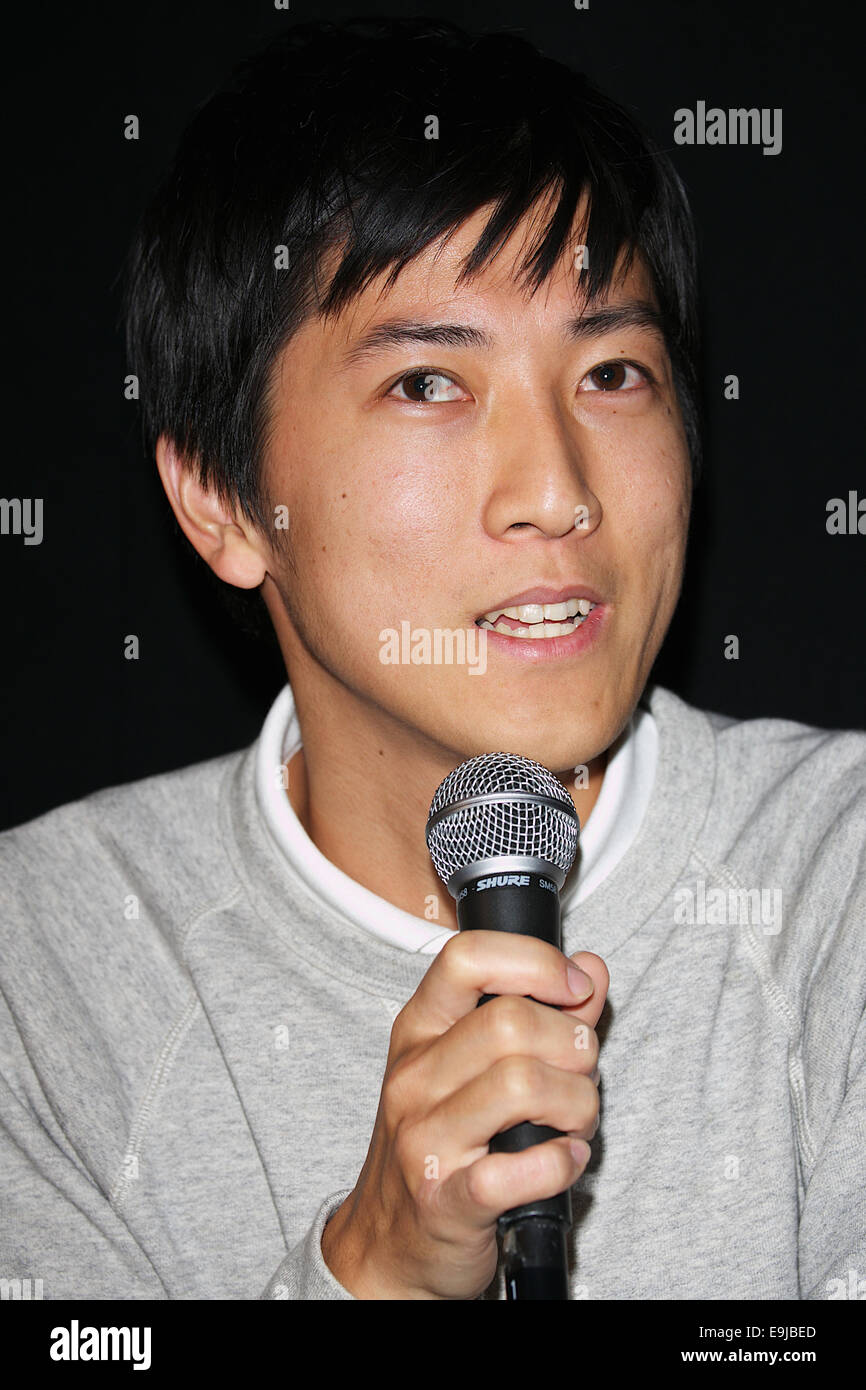 Actor Daichi Tomioka speaks to the audience during the stage greeting ...