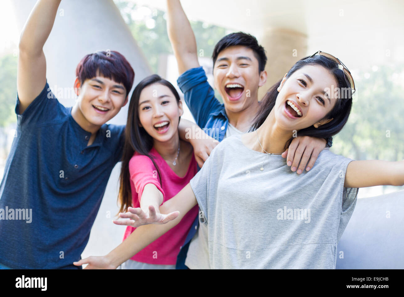 Happy young friends Stock Photo - Alamy
