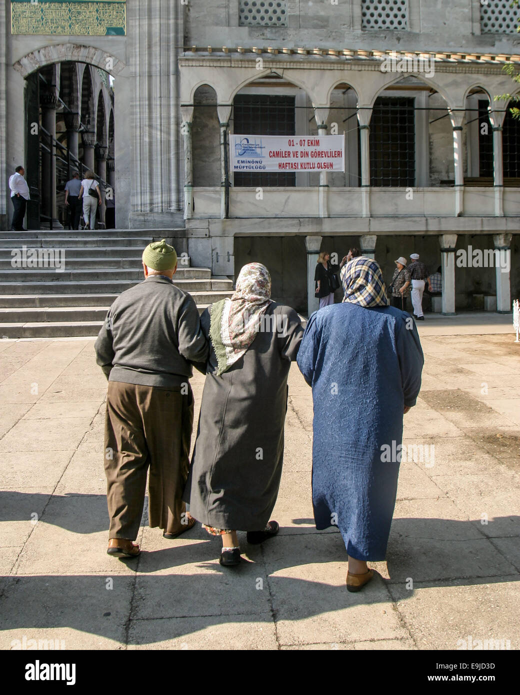 Istanbul, Turkey. 2nd Oct, 2004. A trio of Turkish Muslims head to ...