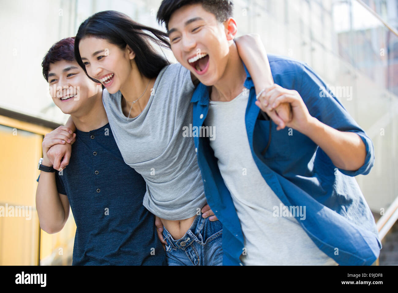 Young friends playing together Stock Photo - Alamy