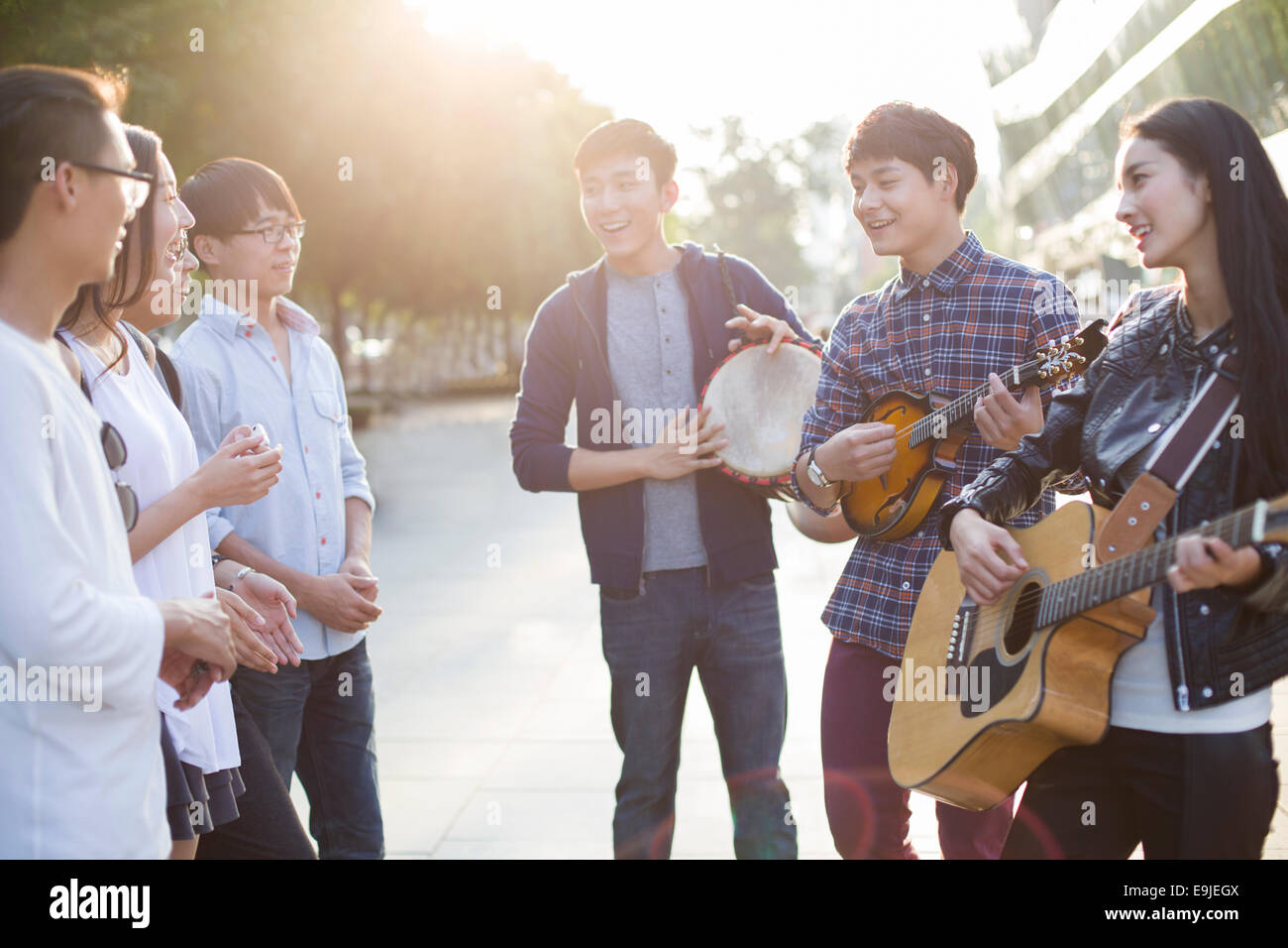 Young women showing their band hi-res stock photography and images - Alamy