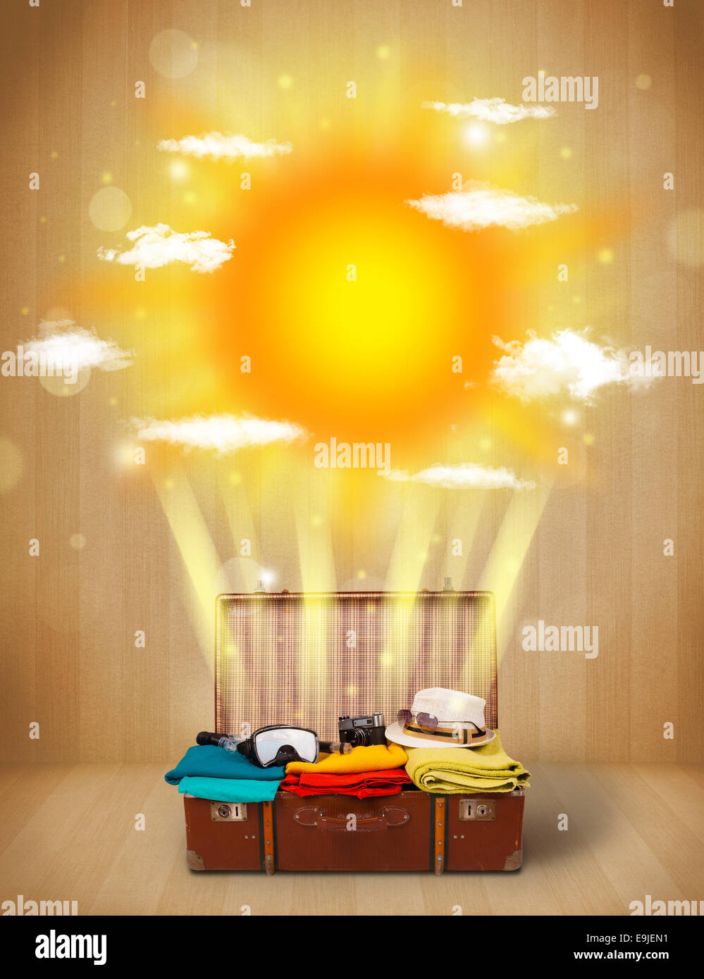 Summer bright sun with clouds and tourist bag Stock Photo - Alamy