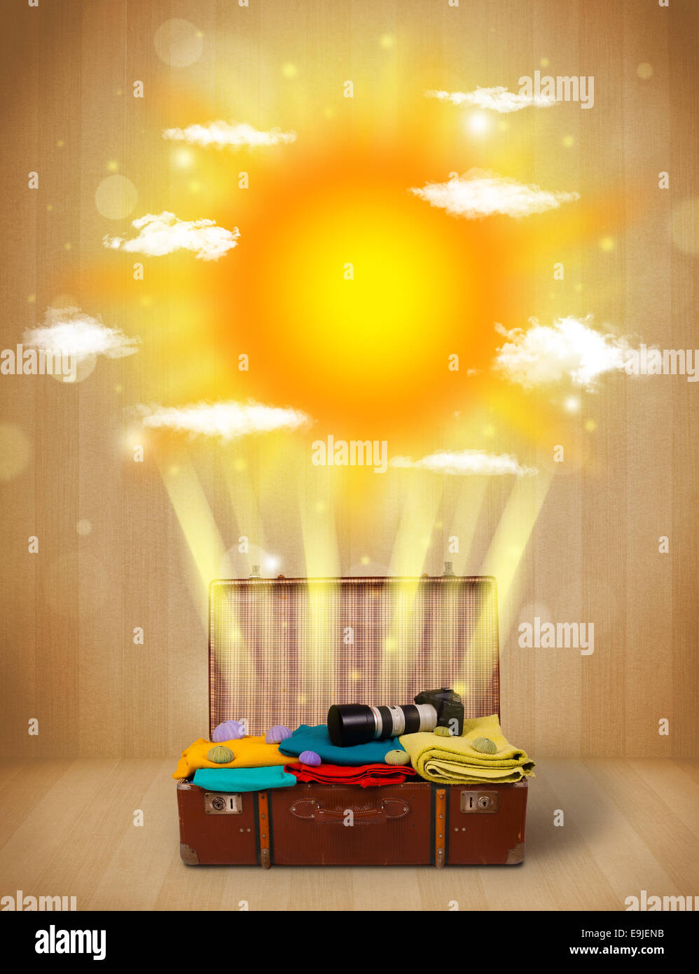 Summer bright sun with clouds and tourist bag Stock Photo - Alamy
