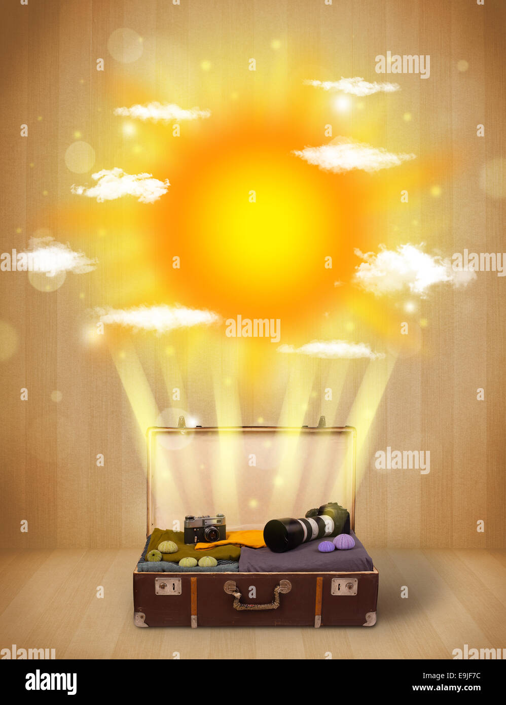 Summer bright sun with clouds and tourist bag Stock Photo - Alamy