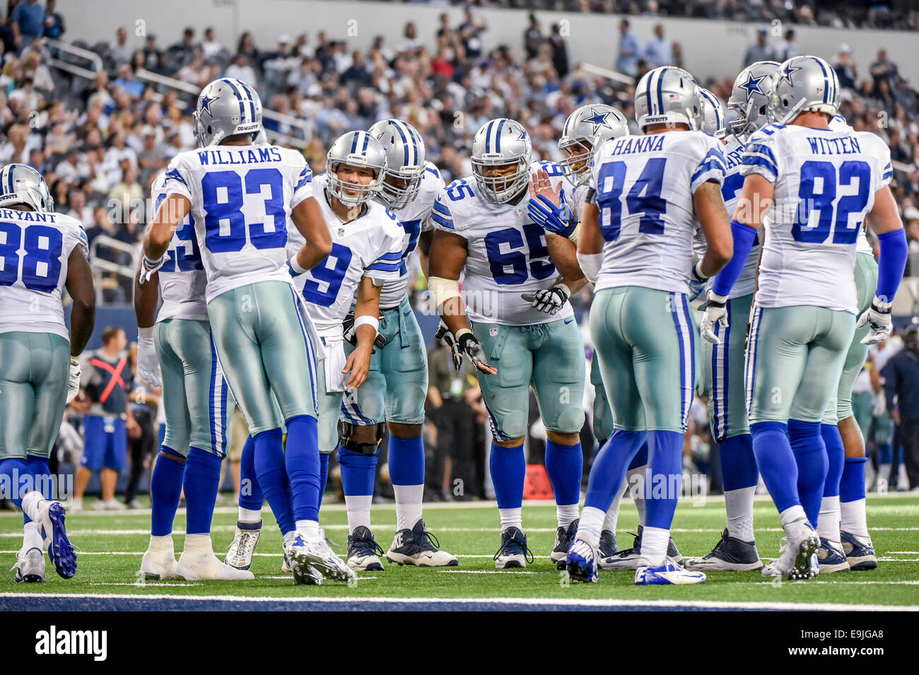 Dallas Cowboys quarterback Tony Romo (9) in a huddle.in an NFL football ...