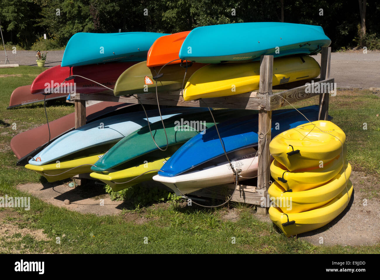 Colorful plastic kayaks Stock Photo - Alamy