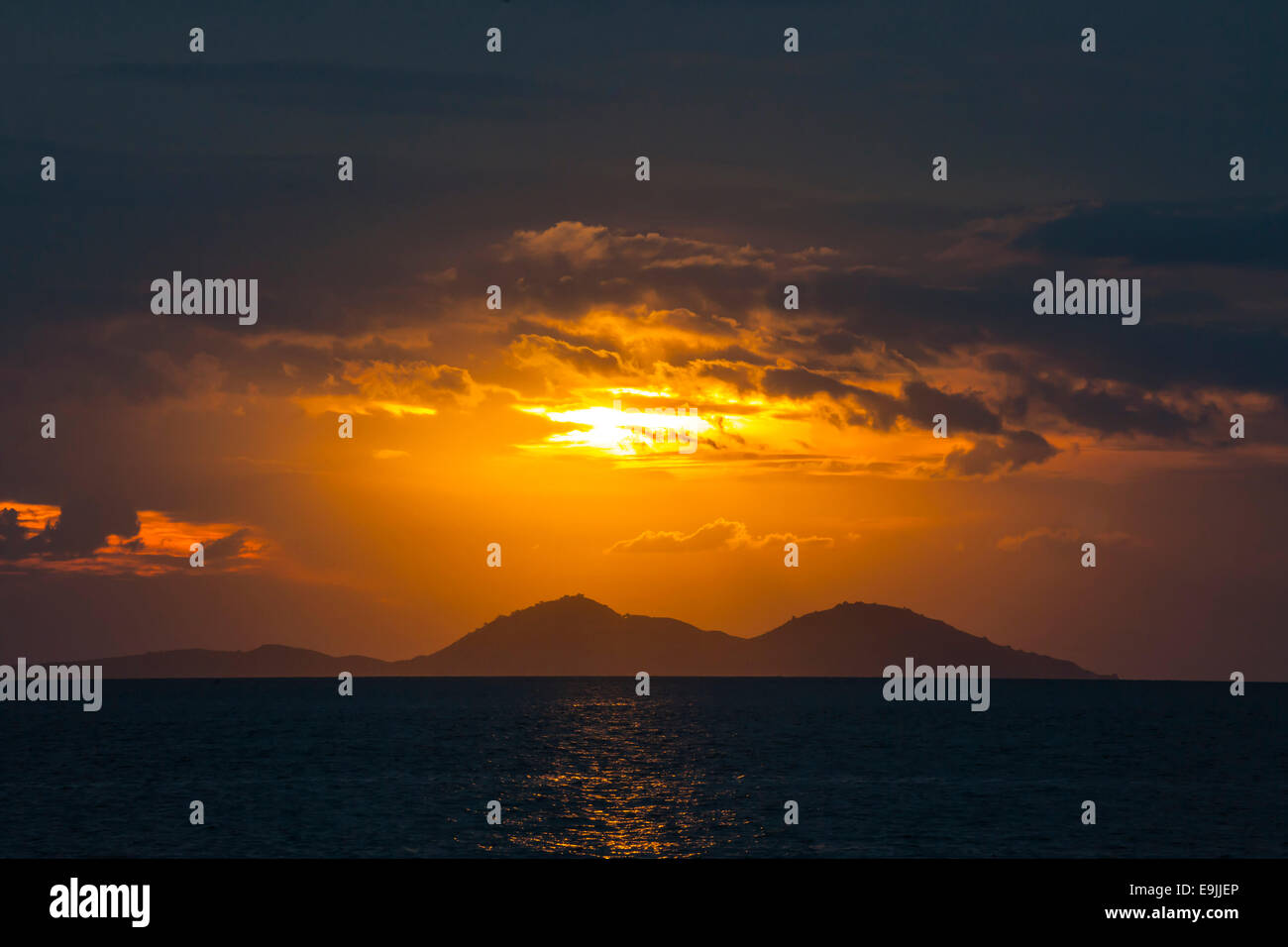 Sunset on the west coast of Flores Island, Komodo, Nusa Tenggara Timur ...