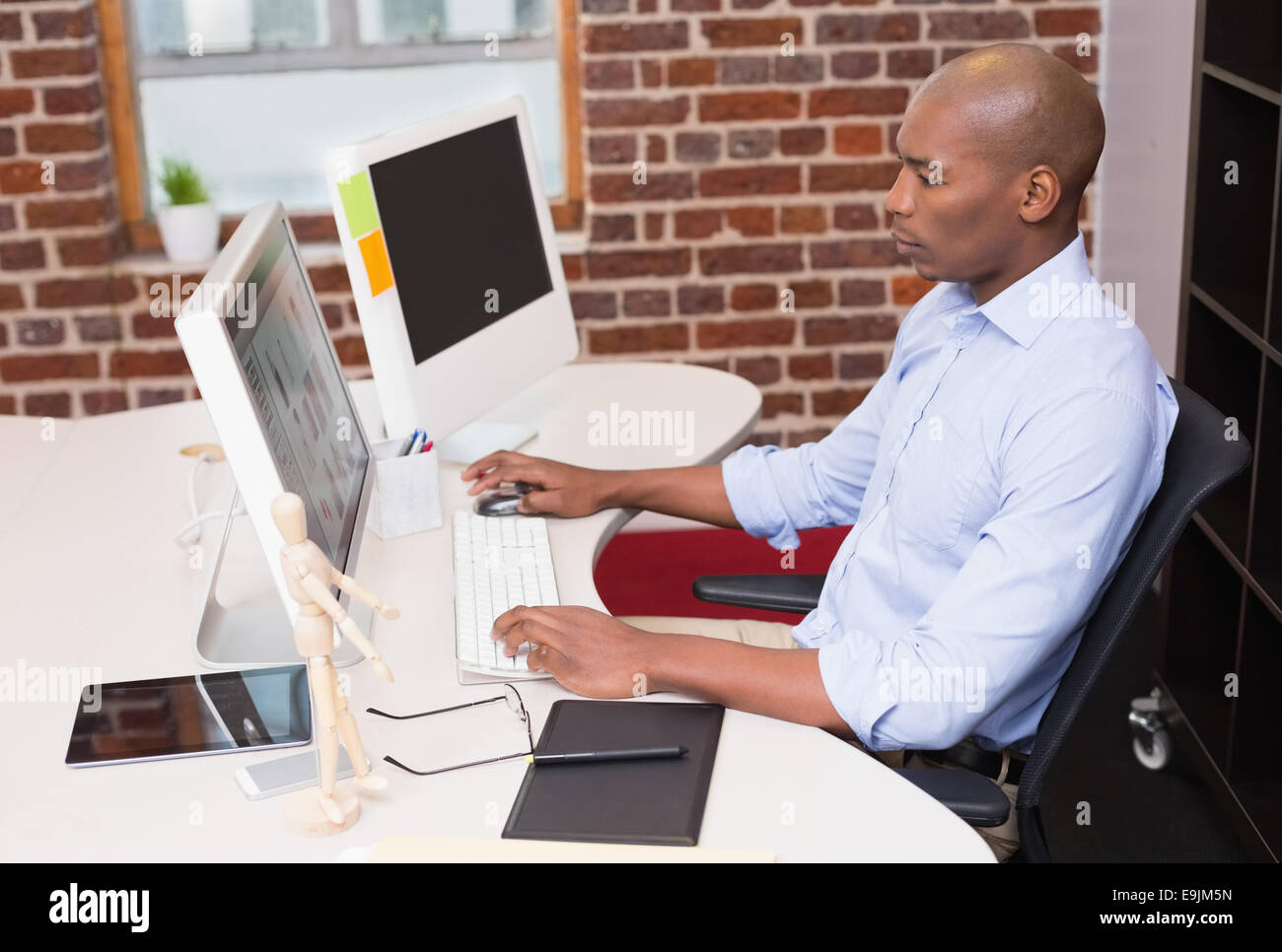 Businessman using computer in office Stock Photo - Alamy