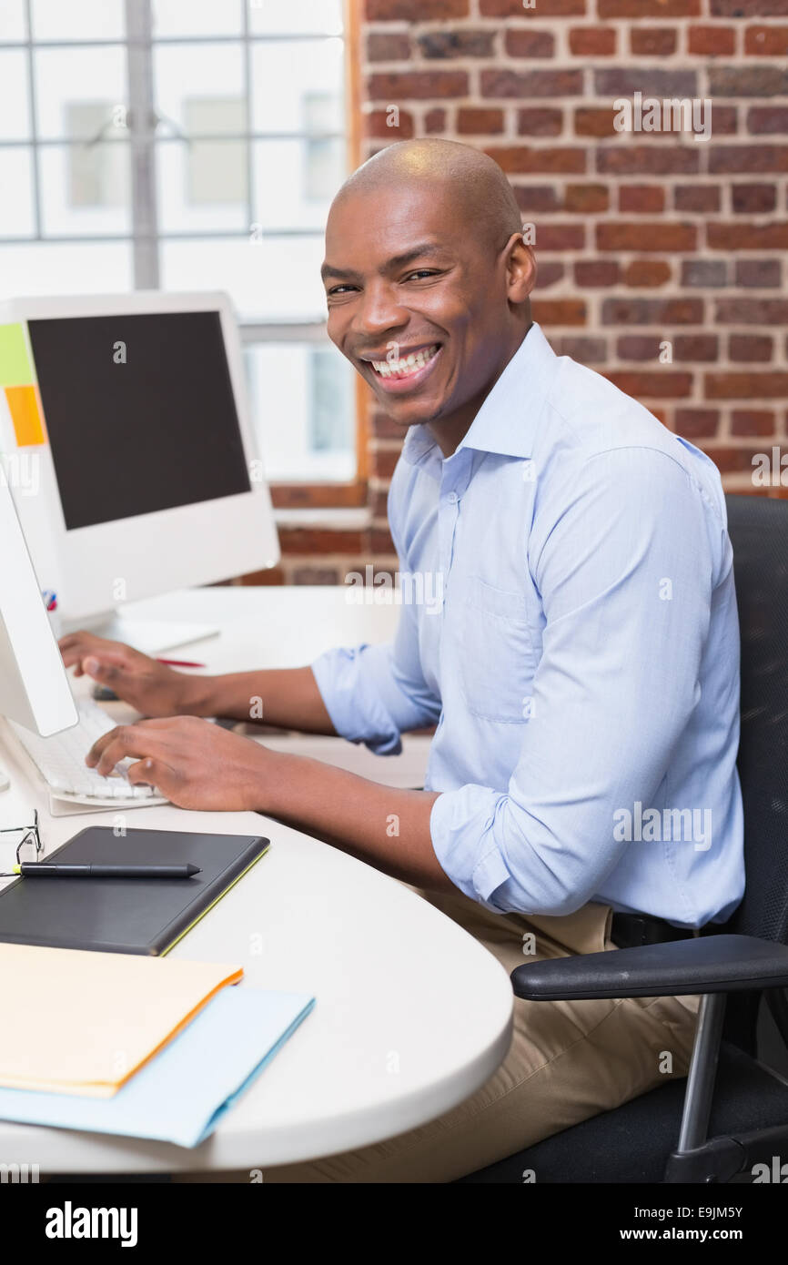 Portrait of businessman using computer Stock Photo - Alamy