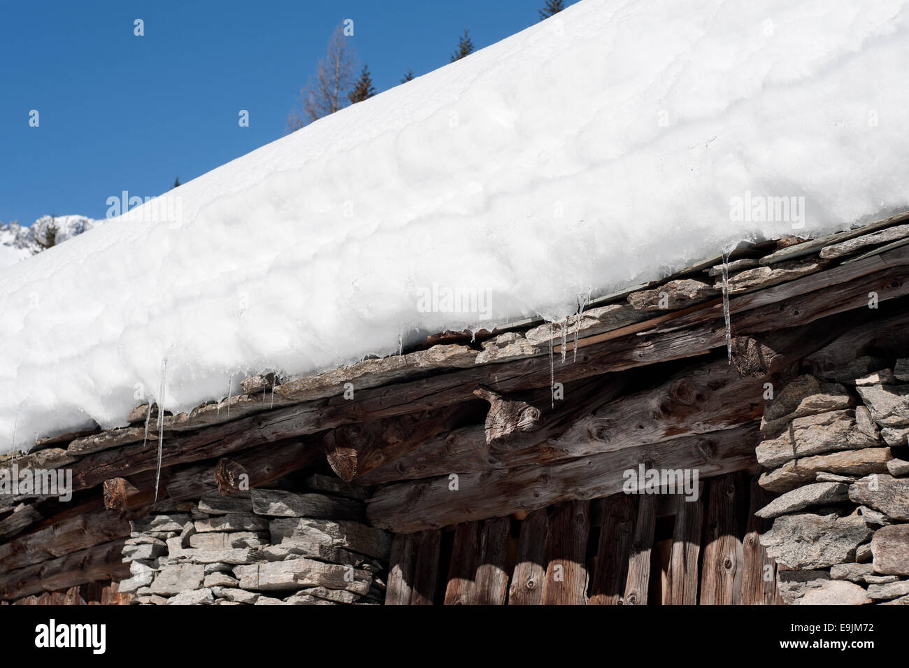 old alpine homestead snowbound, roof closeup Stock Photo - Alamy