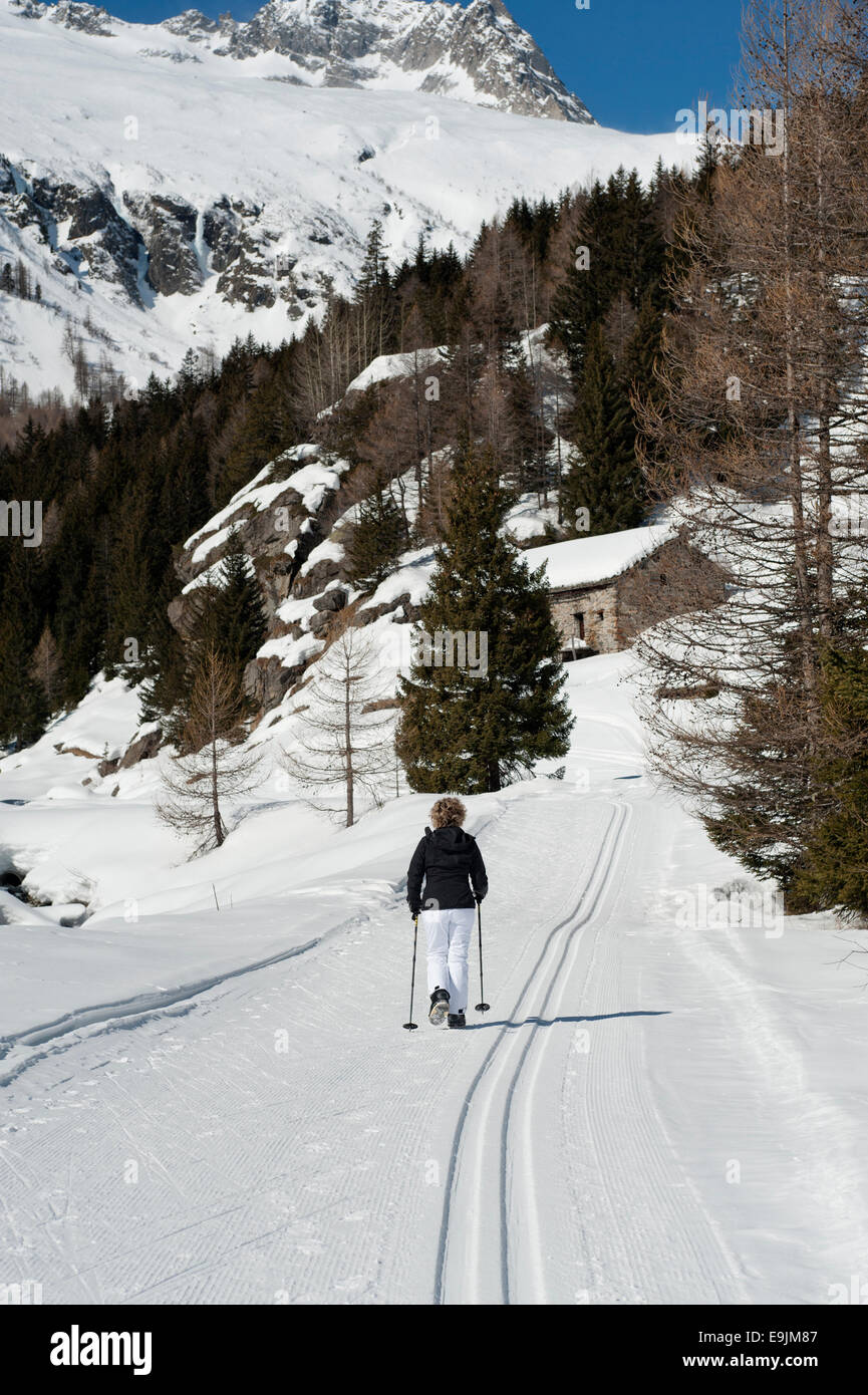 girl walking on the track cross-country Stock Photo - Alamy