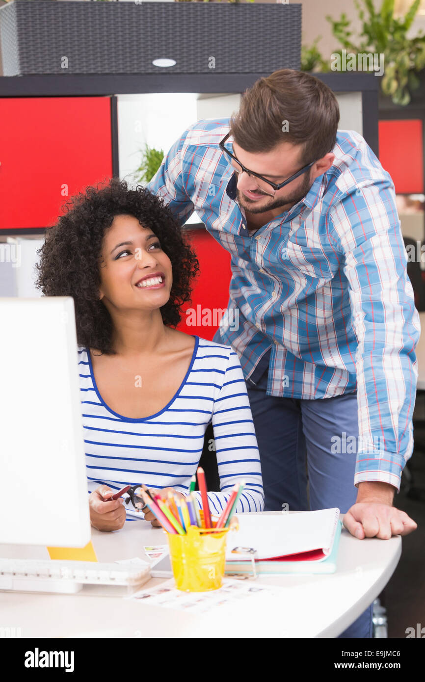 Photo editors using computer in office Stock Photo - Alamy