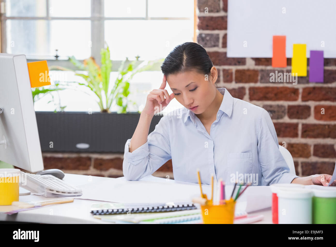Serious concentrated woman working hi-res stock photography and images ...