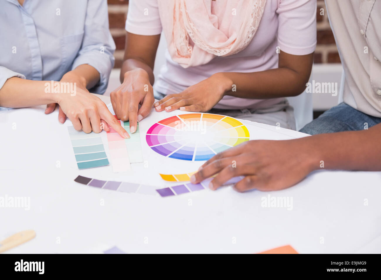 Interior designer working with clients Stock Photo - Alamy