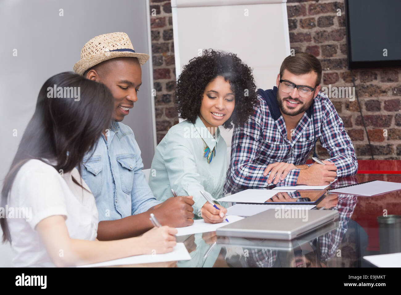 Creative business team in meeting Stock Photo - Alamy