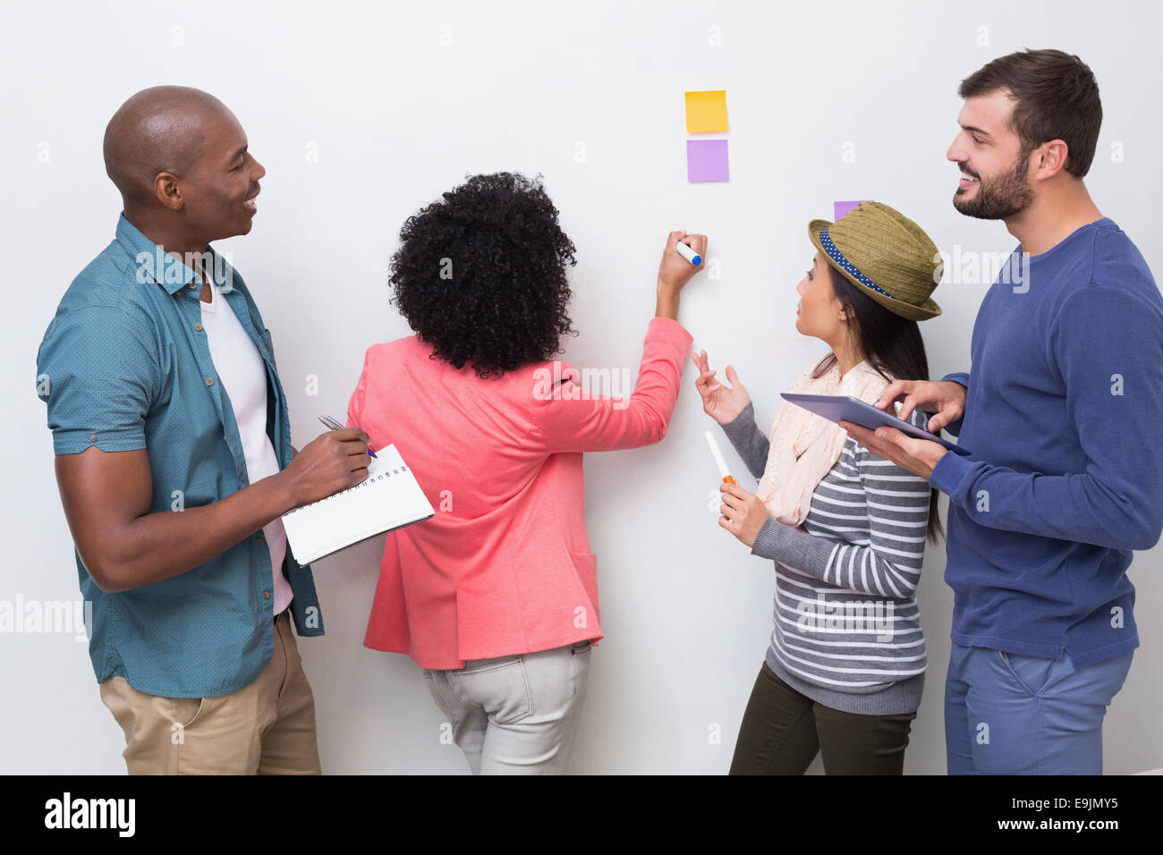 Design team brainstorming in meeting hi-res stock photography and ...