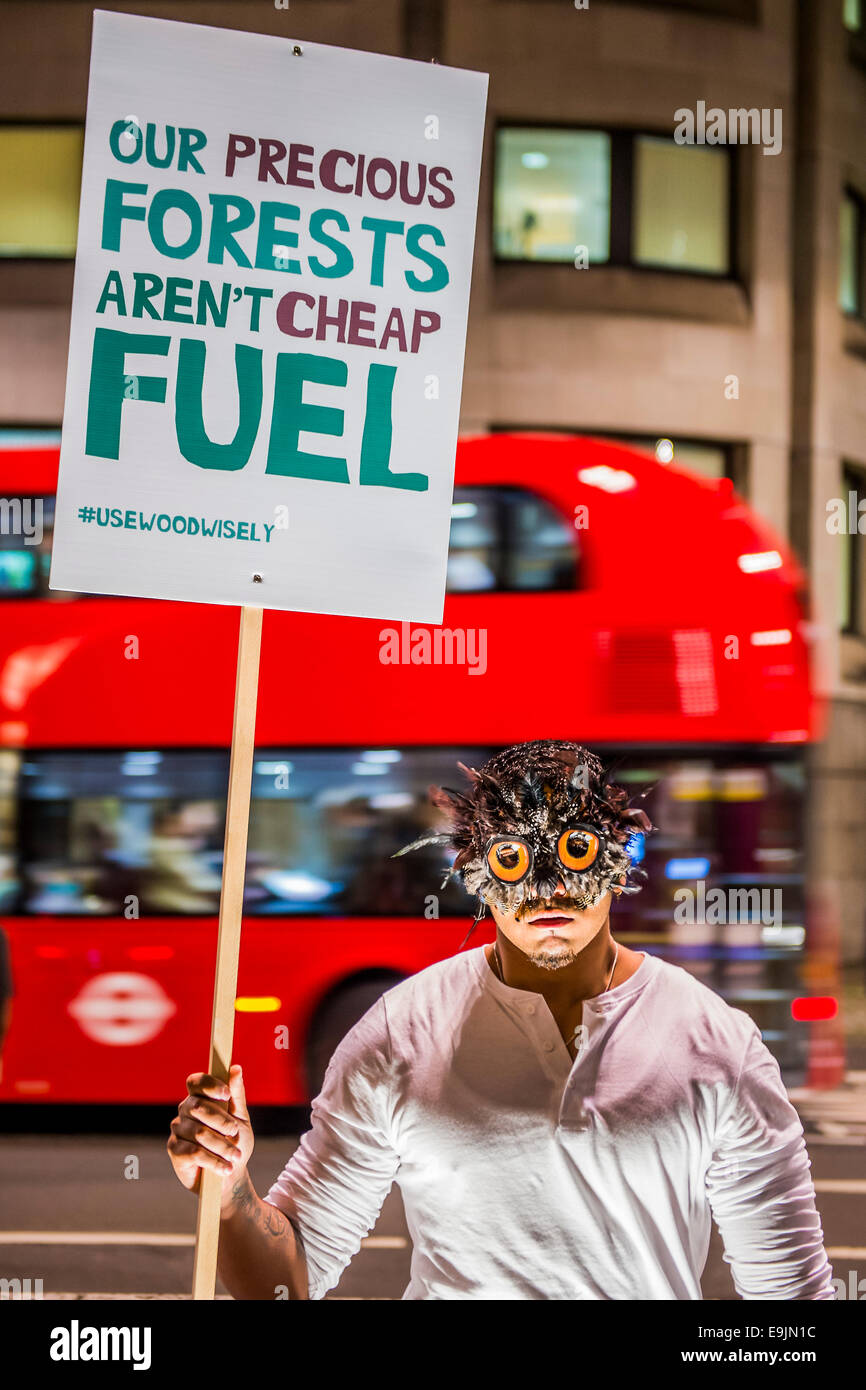 London, UK. 28th Oct, 2014. Environmental campaigners protest (some in ...