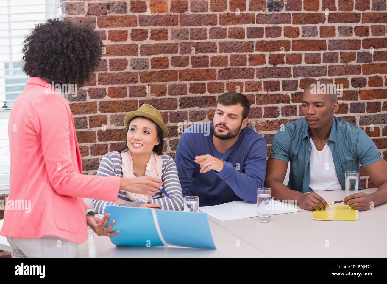 Creative business team in meeting Stock Photo - Alamy