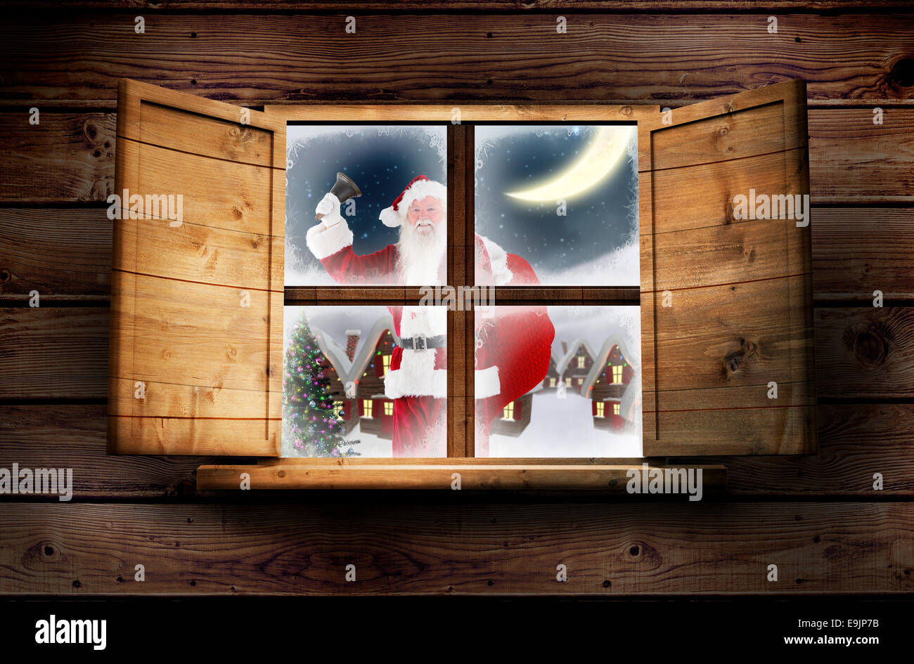 Composite image of santa delivery presents to village Stock Photo - Alamy