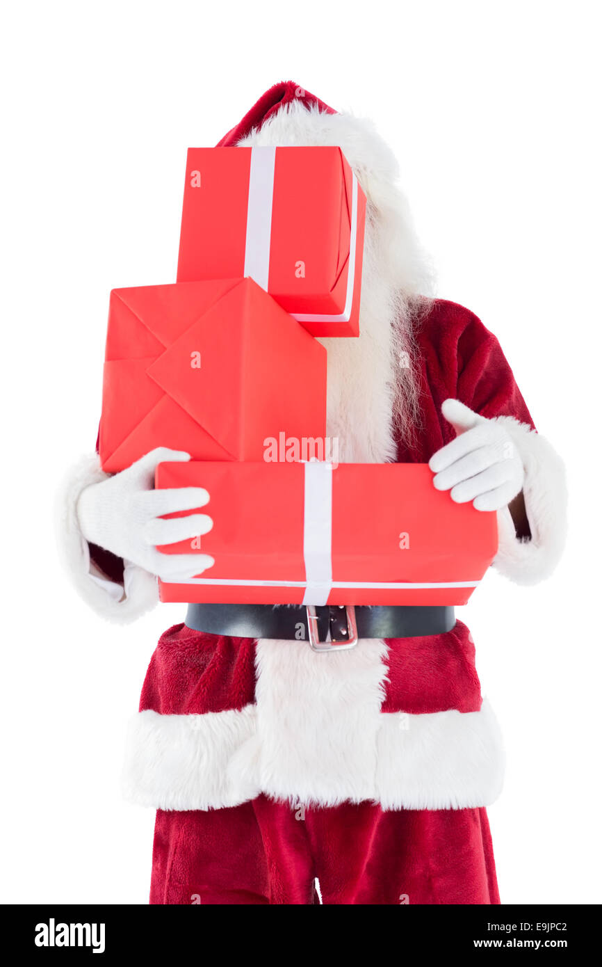 Santa covers his face with presents Stock Photo - Alamy