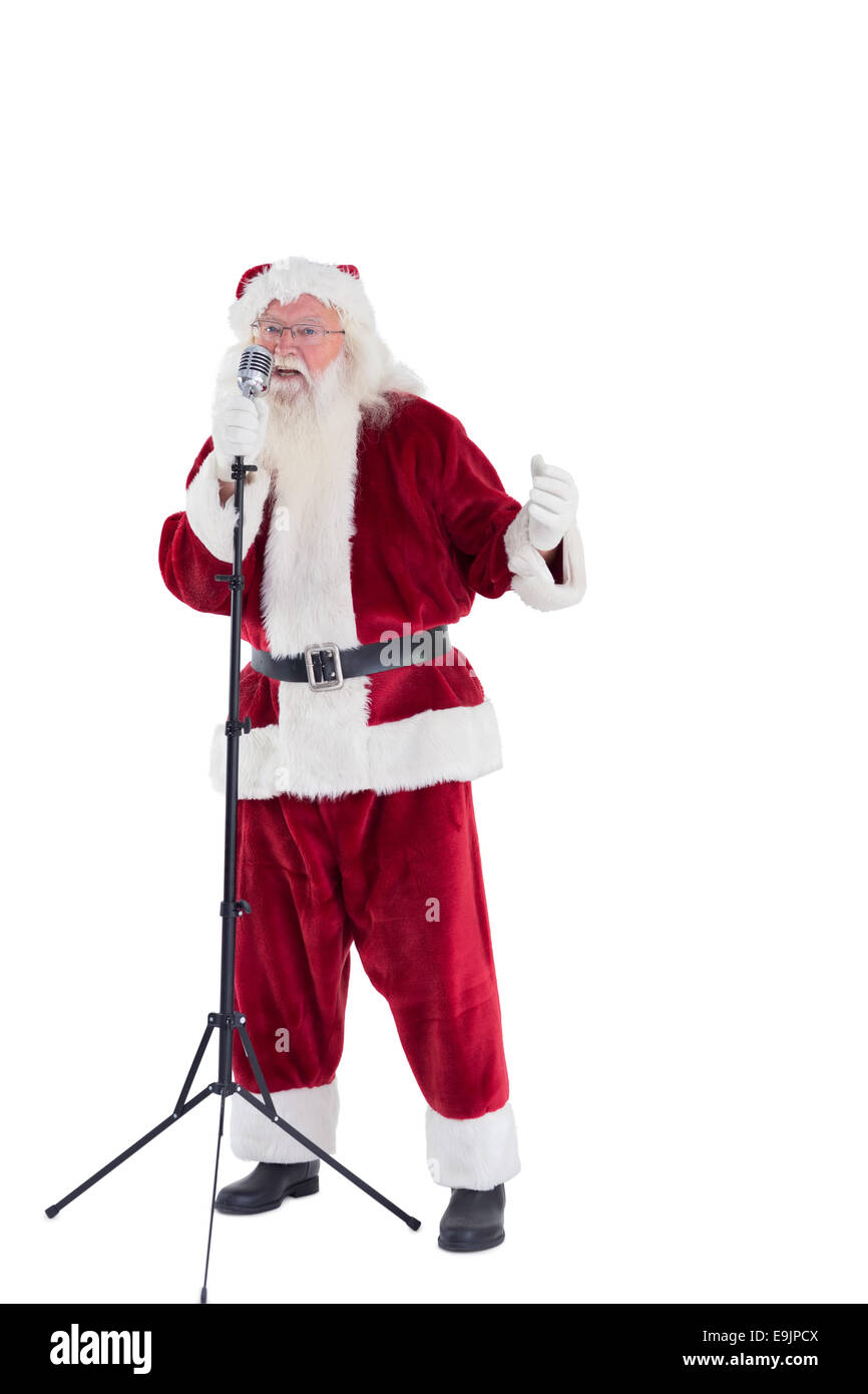 Santa sings like a Superstar Stock Photo - Alamy