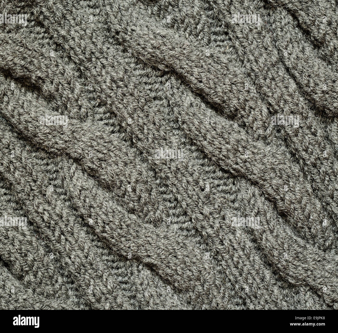 Gray knitted background with braids Stock Photo - Alamy