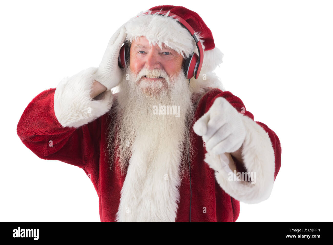 Santa is listening some music Stock Photo - Alamy