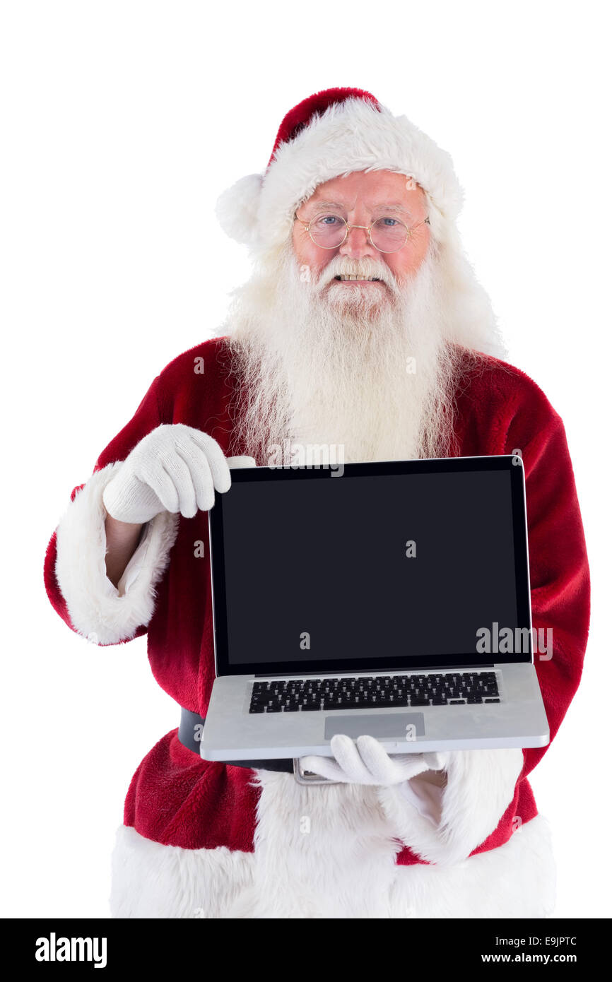 Santa Claus presents a laptop Stock Photo - Alamy