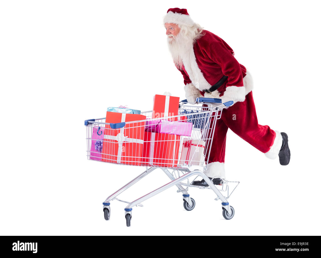 Santa rides on a shopping cart Stock Photo - Alamy