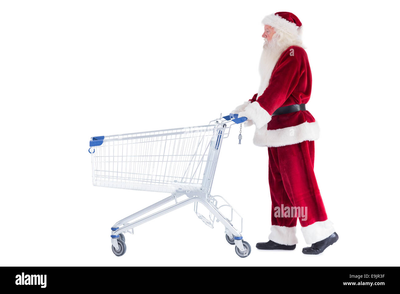 Santa pushes a shopping cart Stock Photo - Alamy