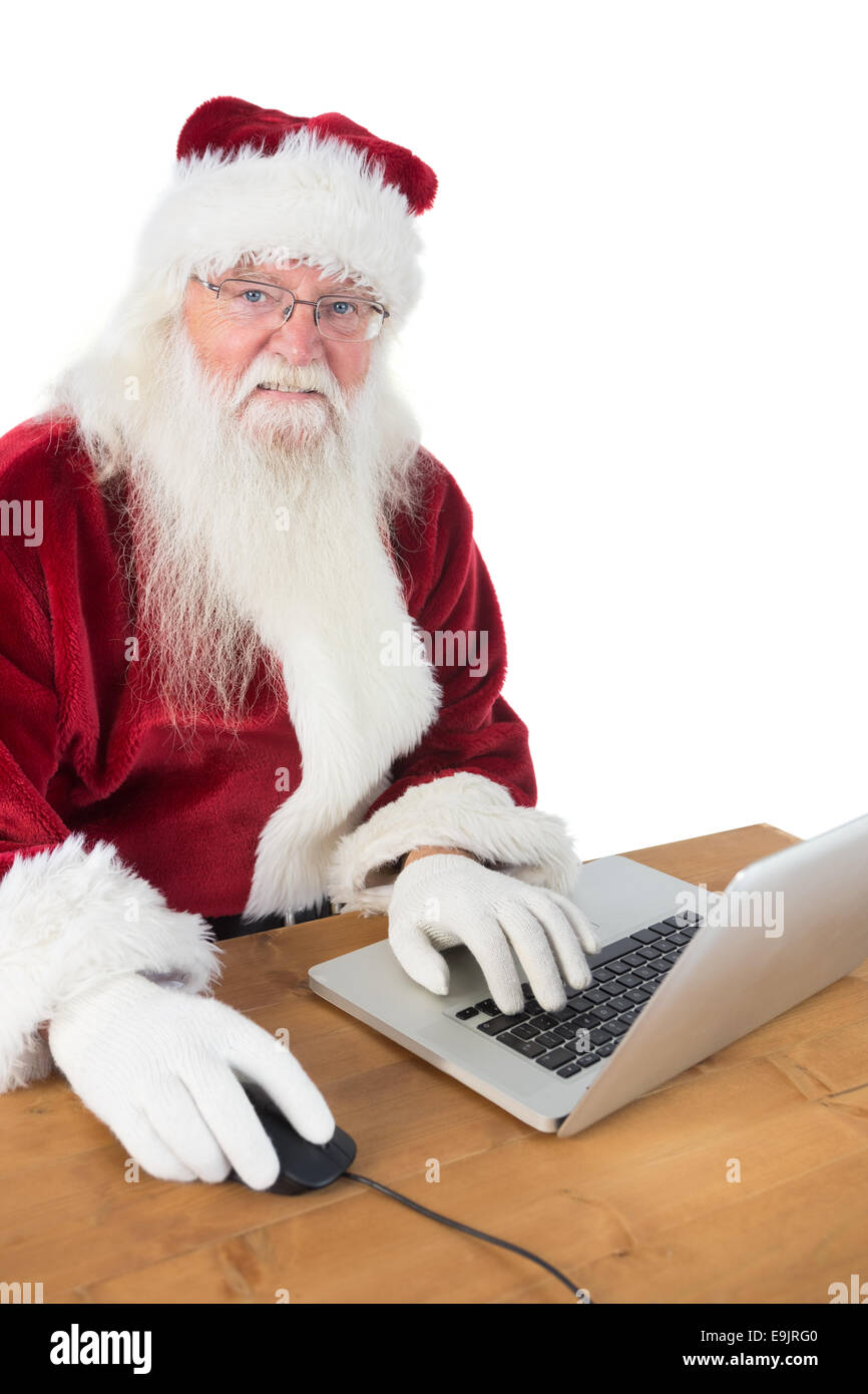 Santa surfs on the internet Stock Photo - Alamy