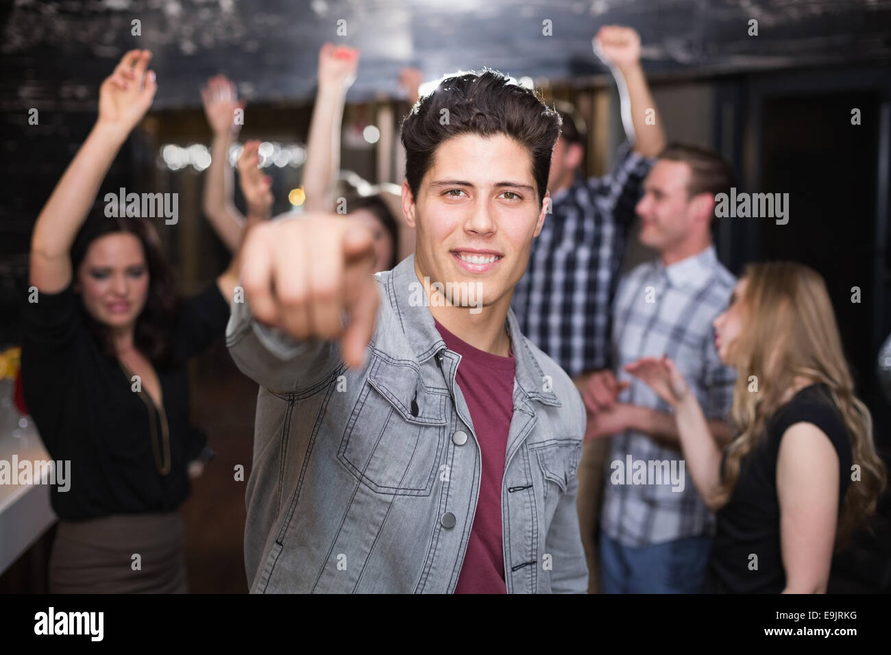 Stylish man smiling and dancing Stock Photo - Alamy