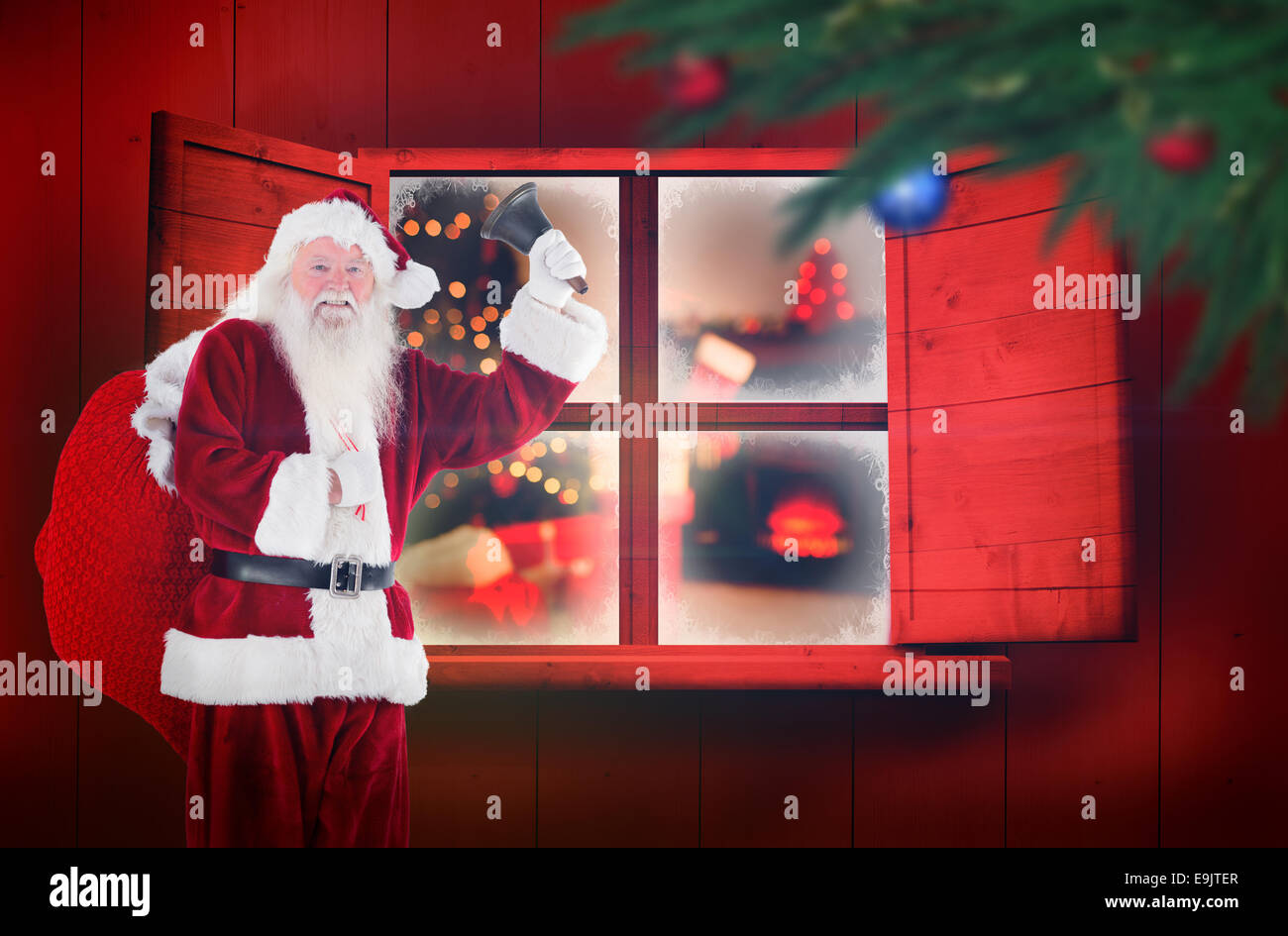 Composite image of santa claus ringing bell Stock Photo - Alamy