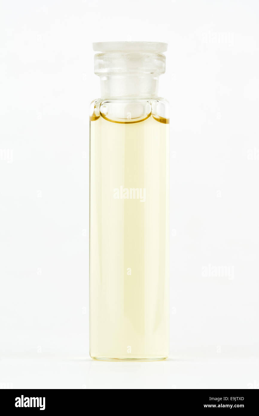 Closeup image of a bottle containing a liquid homeopathic extract ...