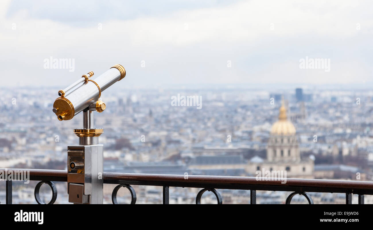 Telescope located on the first level of The Eiffel Tower useful for ...