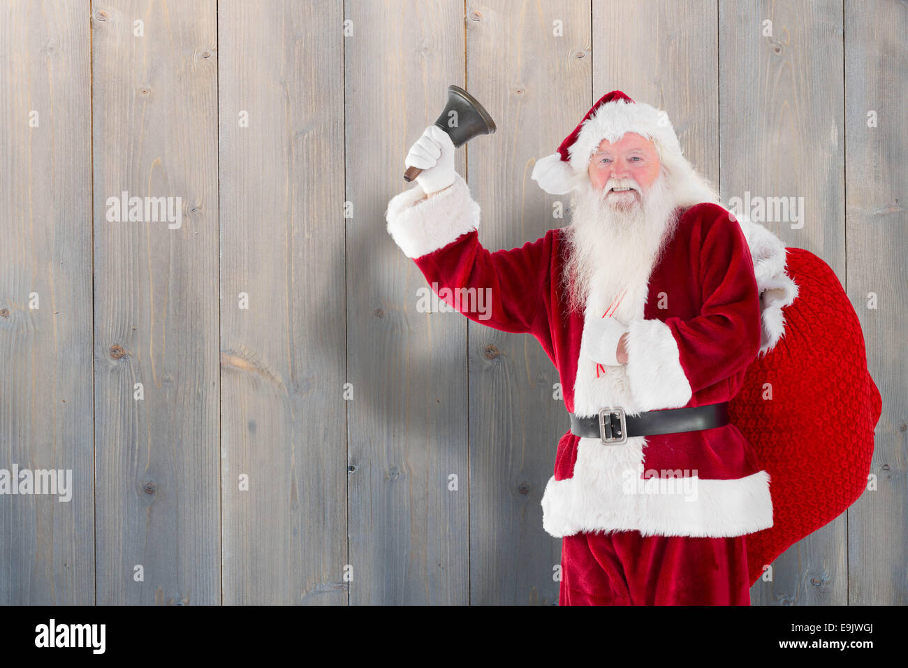 Happy santa claus ringing hi-res stock photography and images - Alamy