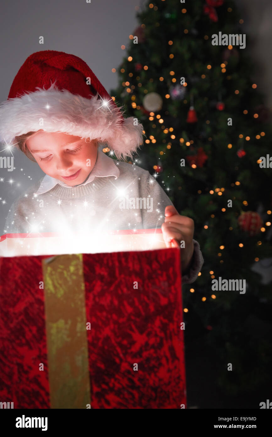 Child opening present hi-res stock photography and images - Alamy